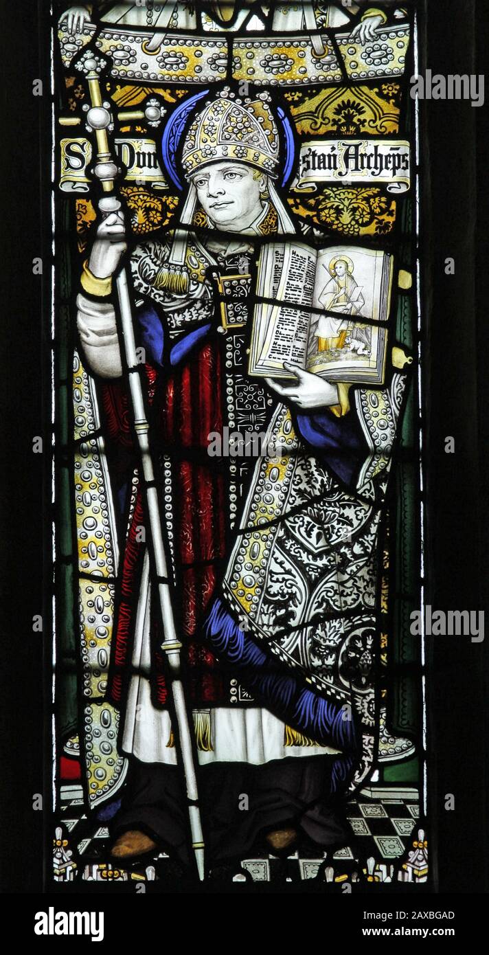 A stained glass window by C E Kempe & Co. Ltd. depicting St. Dunstan as ...