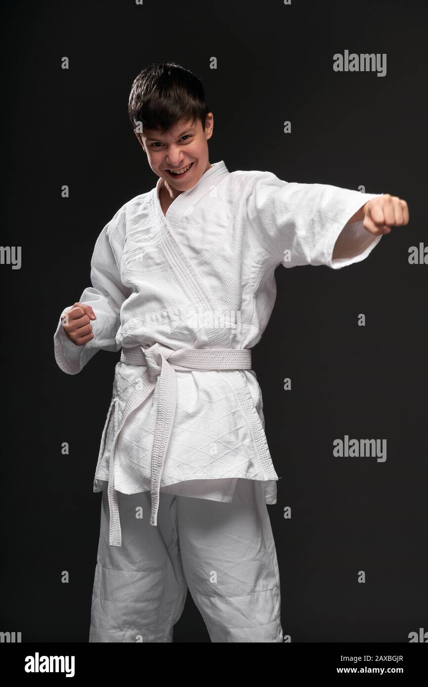Teen boy karate kick hi-res stock photography and images - Alamy