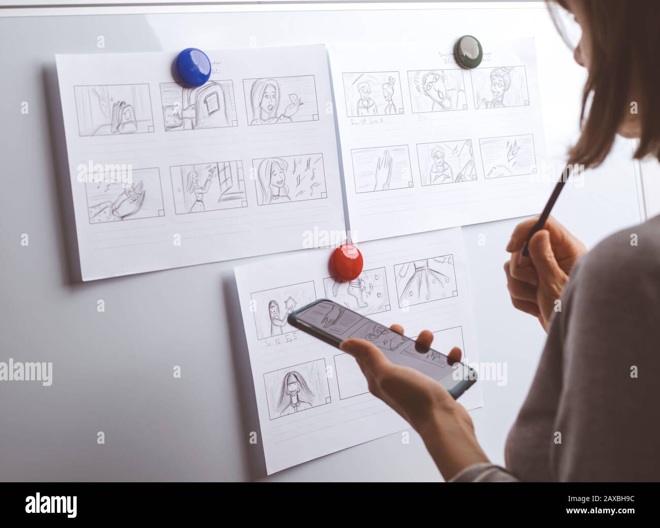 Woman's hand draws a storyboard for a film or cartoon Stock Photo - Alamy