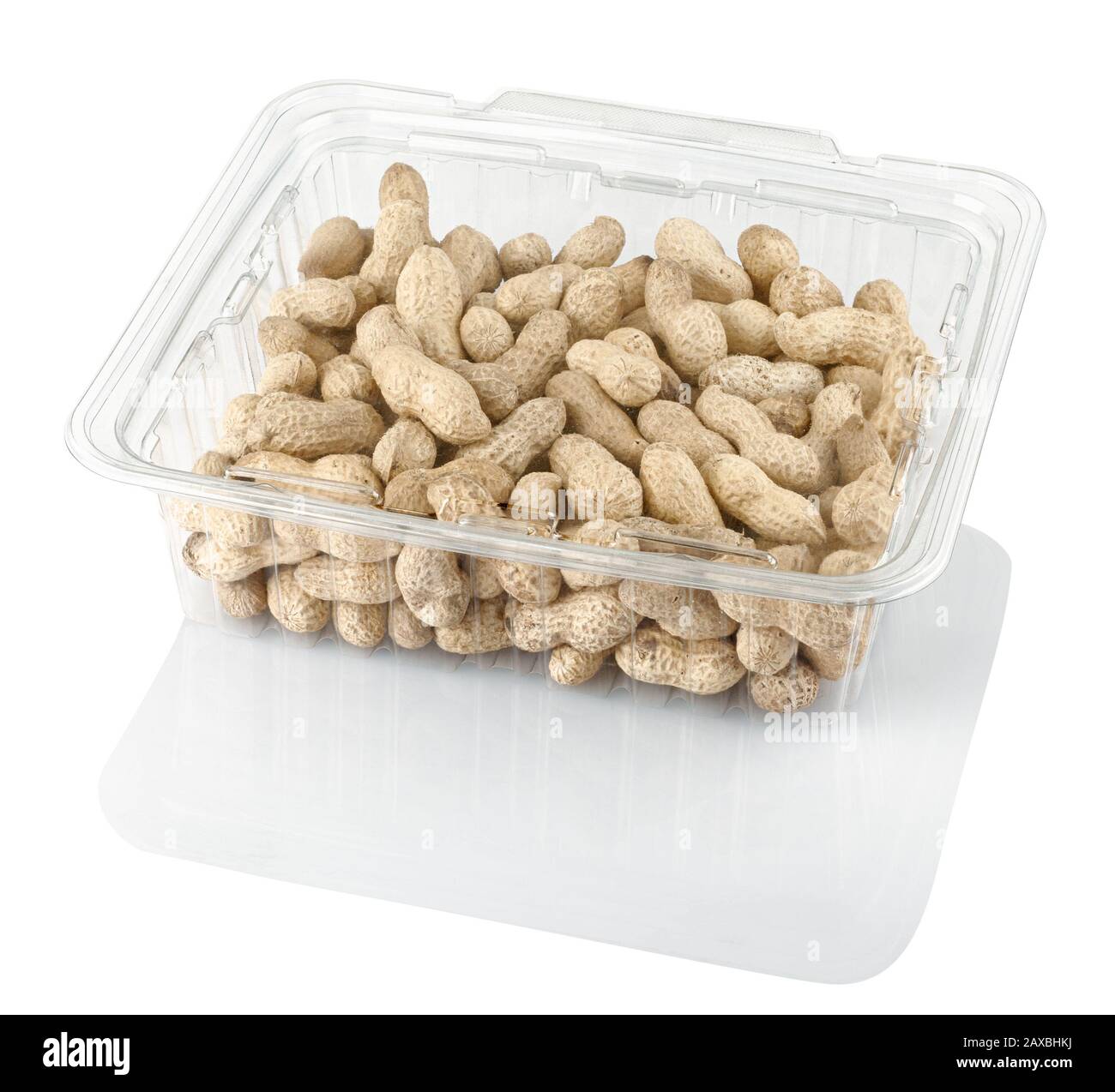 peanuts groundnuts in a transparent plastic box isolated on a white ...