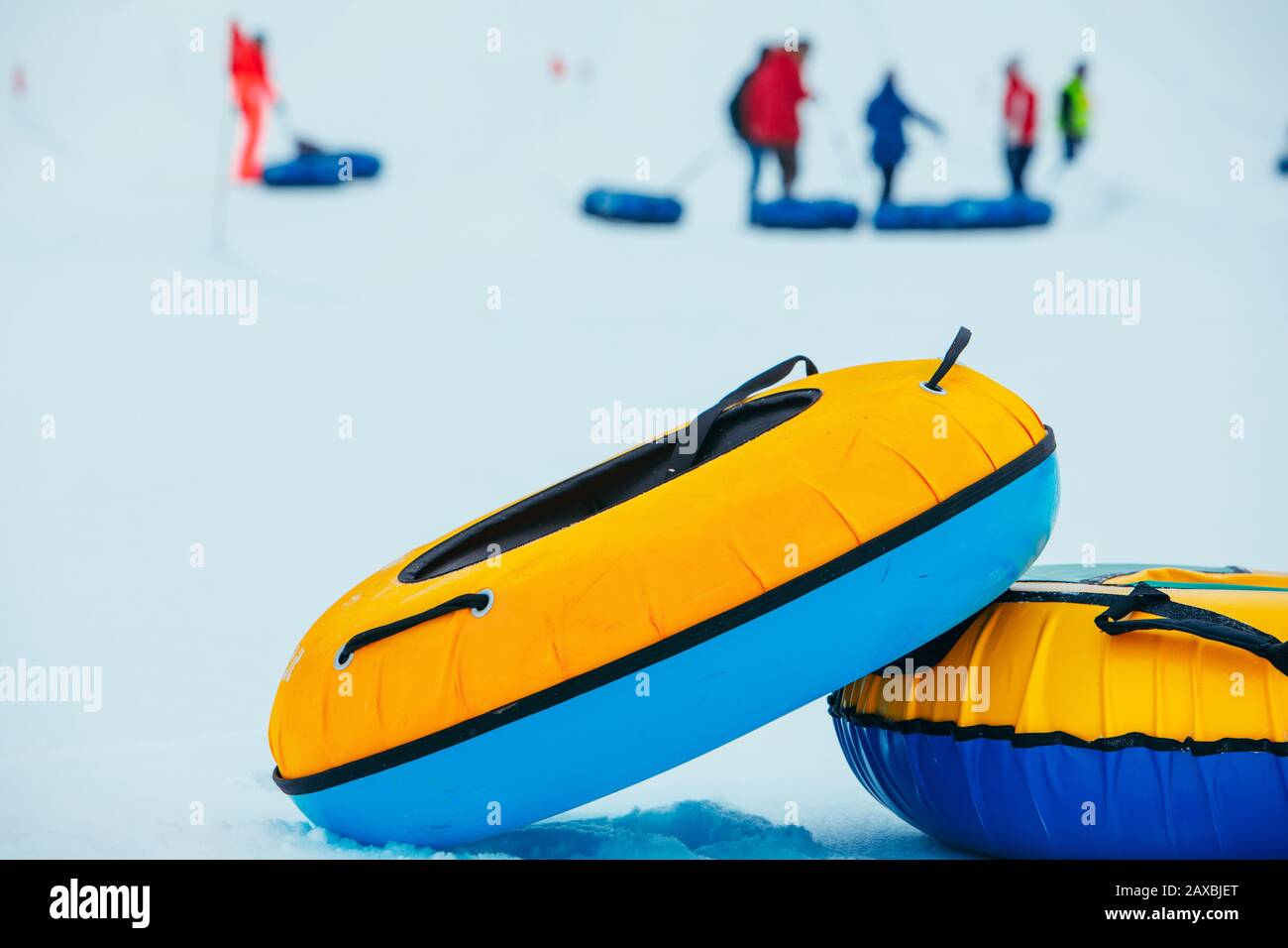 snow tubing rings close up. hill on background Stock Photo - Alamy