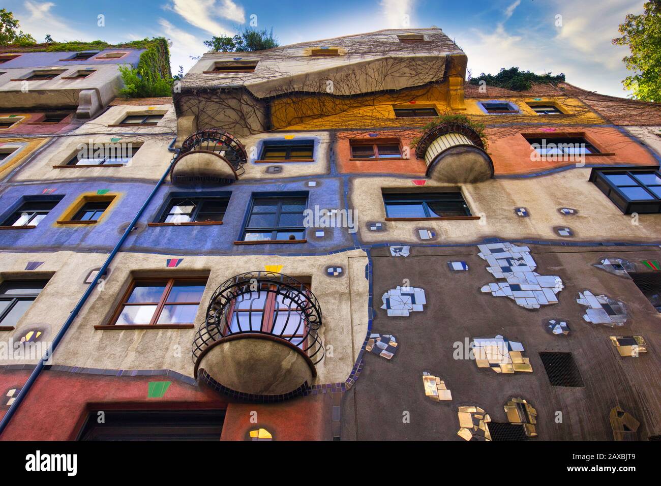The famous The Hundertwasserhaus house, designed by artist/architect ...