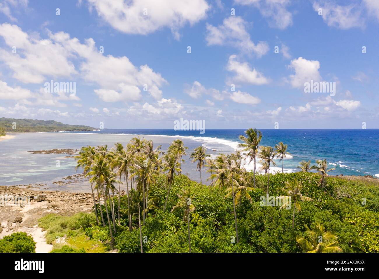 The rocky coast of a tropical island. Siargao, Philippines. Seascape ...