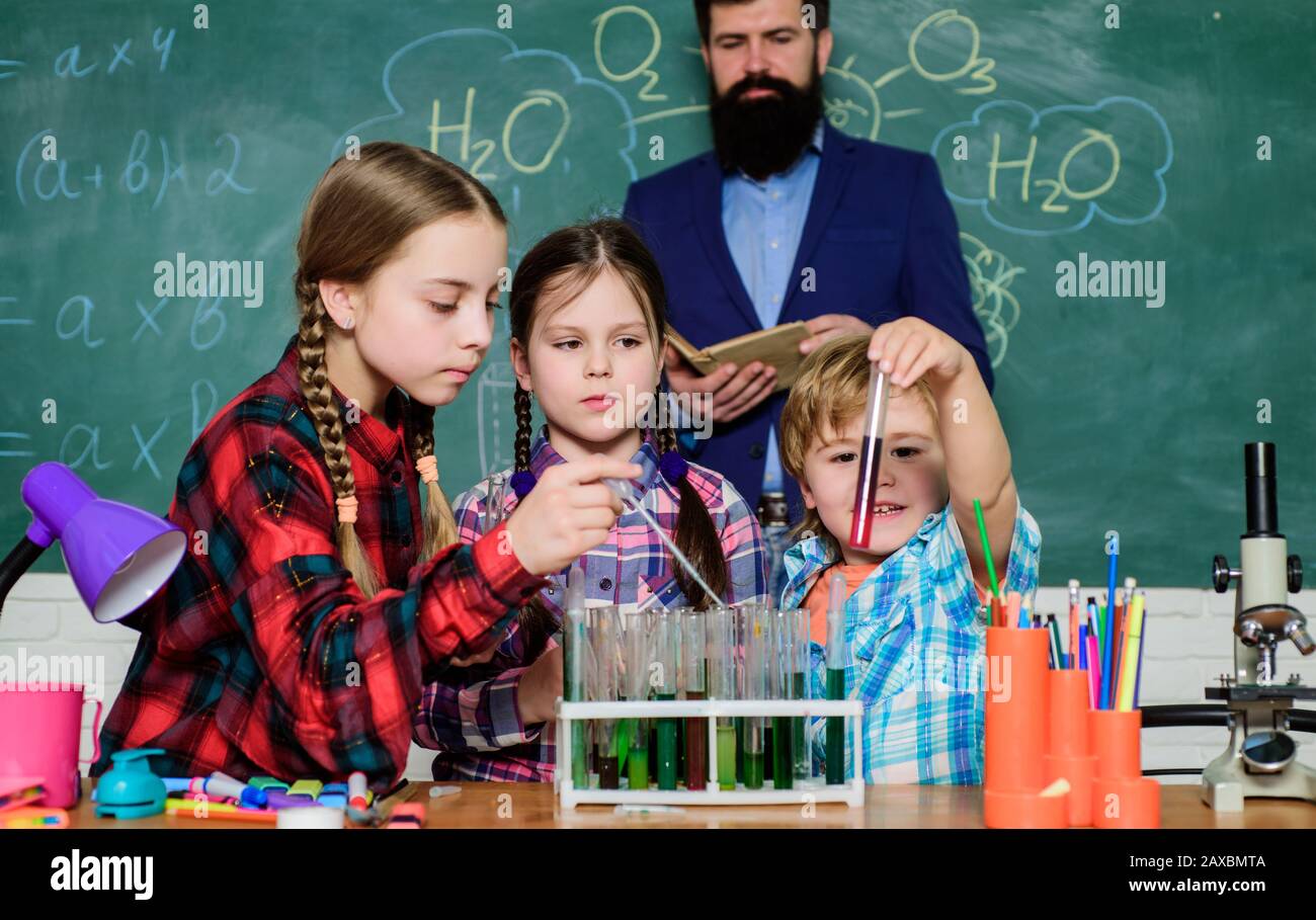 children making science experiments. Education. chemistry lab. happy ...