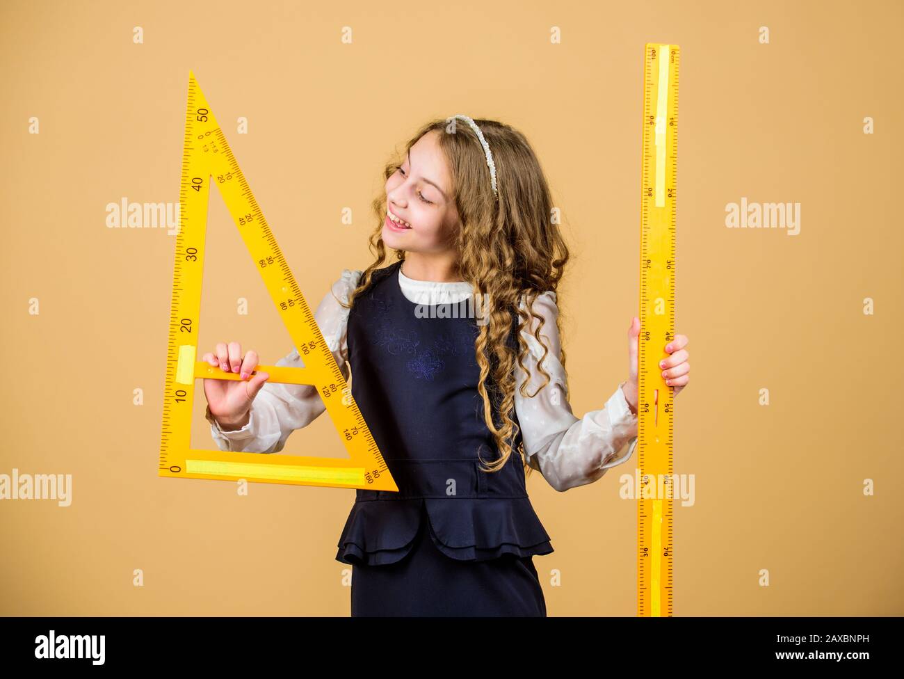 School student study geometry. Kid school uniform hold ruler. Geometry ...