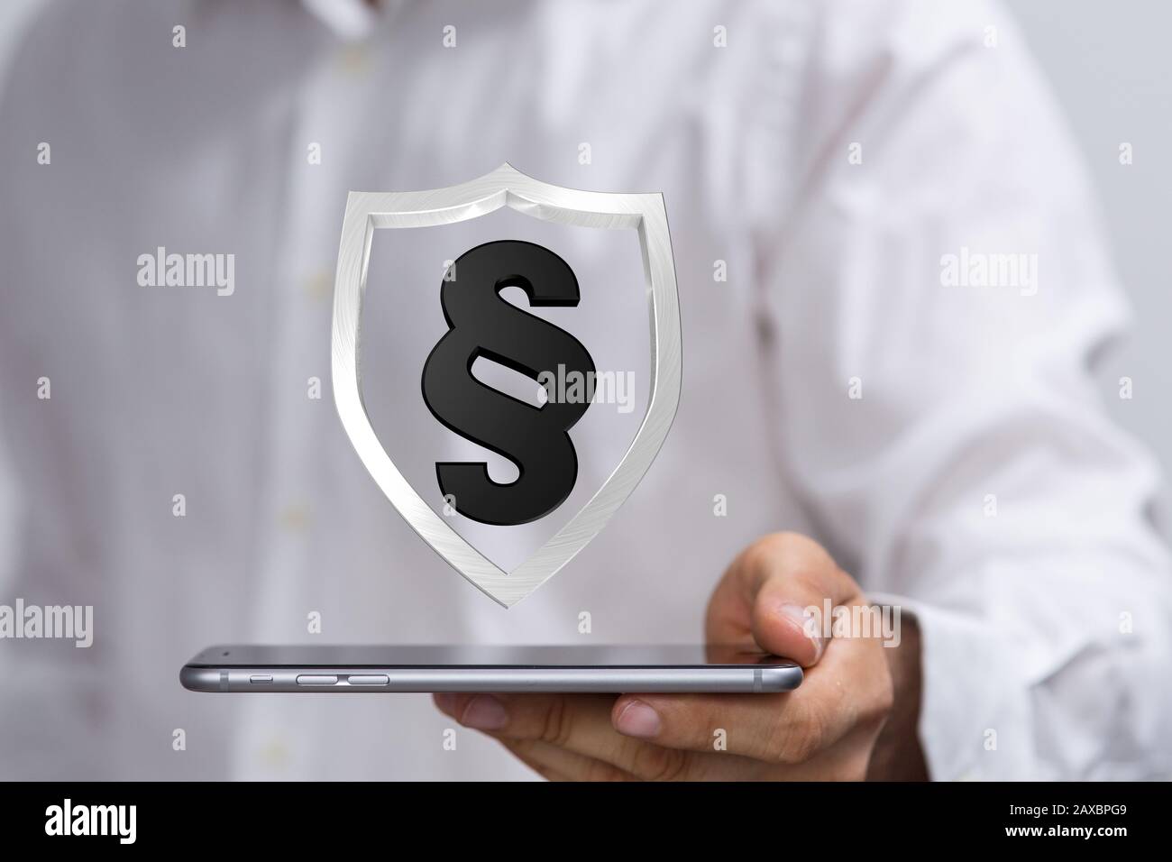 Lawyer working with a virtual projection of a digital paragraph law ...