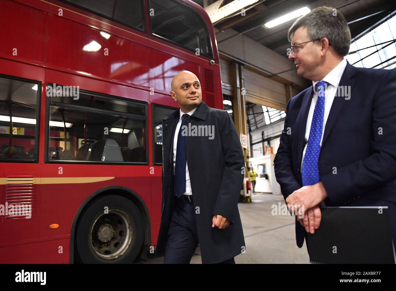 Chancellor of the Exchequer Sajid Javid (left) speaks with Tom Stables ...