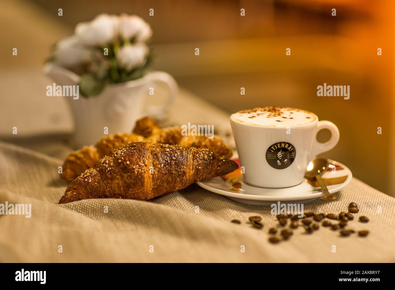 ALBA, ITALY - Apr 27, 2017: close up a cup of cappuccino and croissant ...