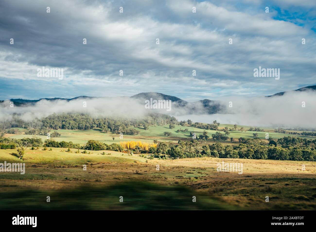 Tranquil scenic view sunny autumn landscape and fog Australia Stock ...