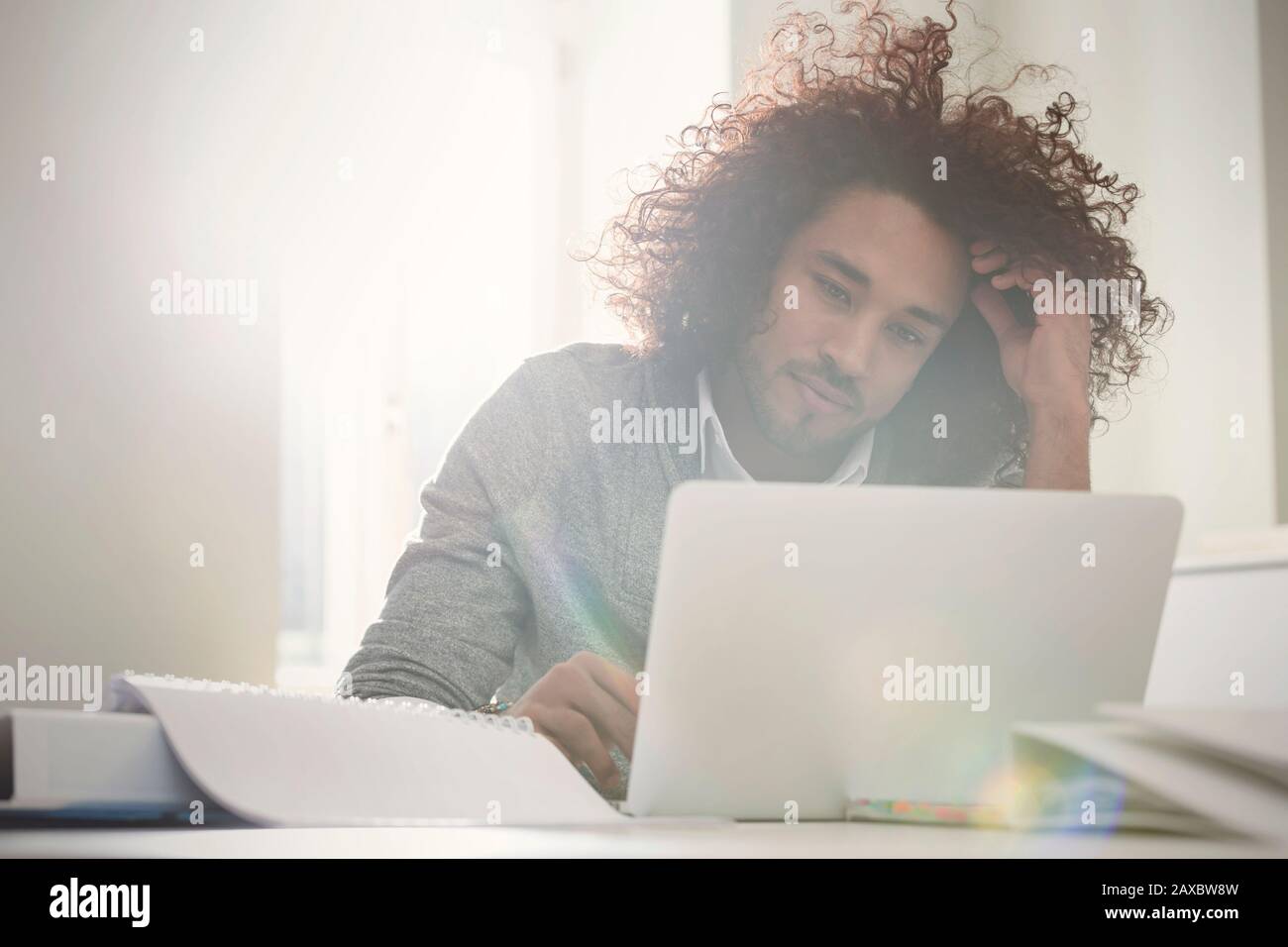 Young man work laptop in hi-res stock photography and images - Alamy