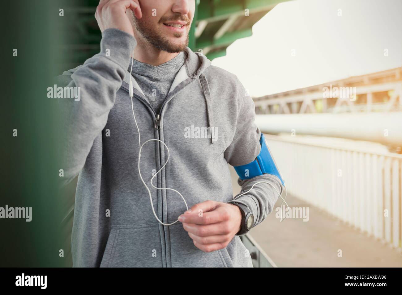 Listen to music running hi-res stock photography and images - Alamy