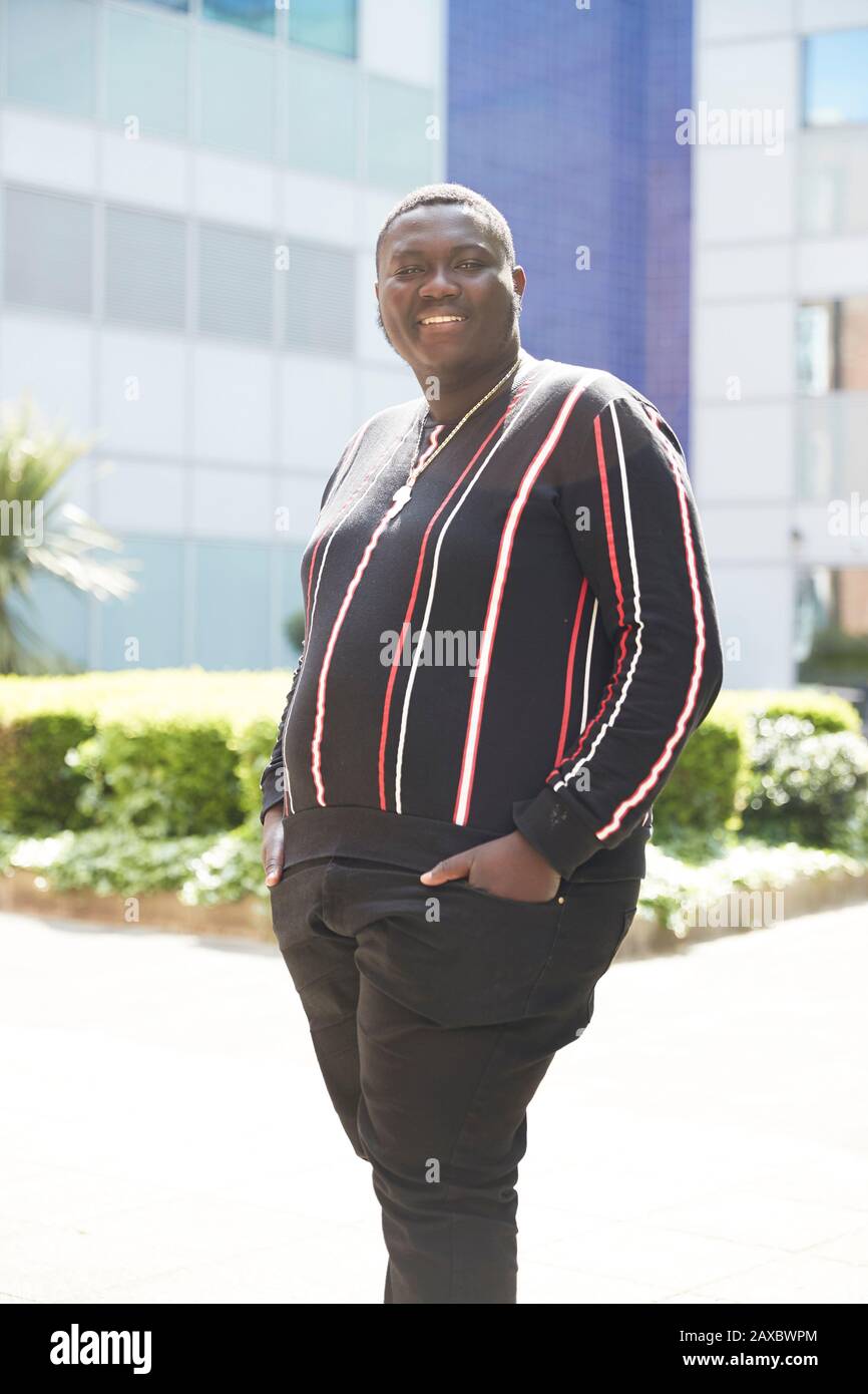 Man standing outside building hi-res stock photography and images - Alamy