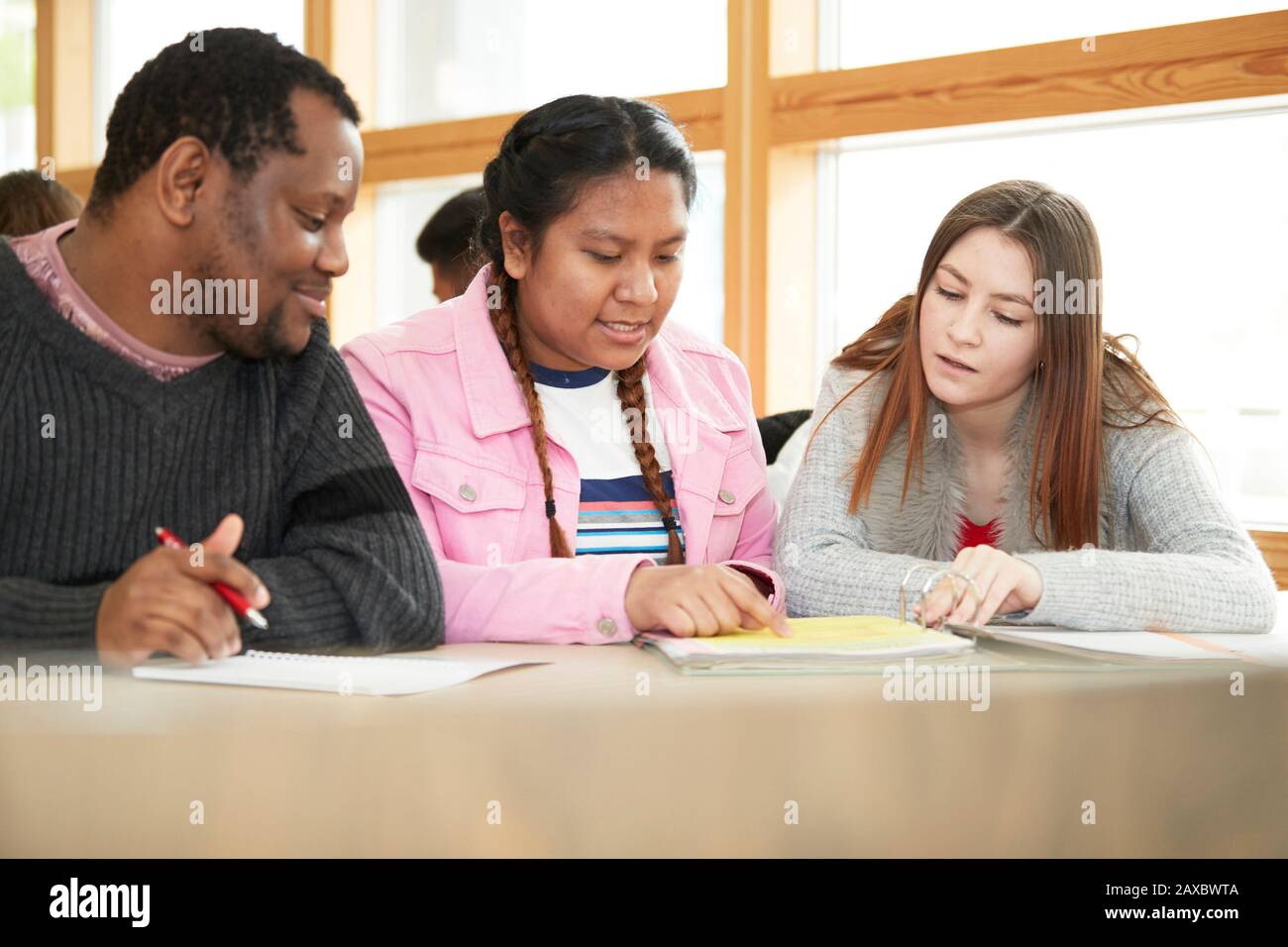 College students studying in classroom Stock Photo - Alamy