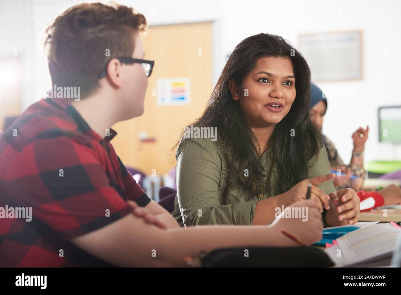College students talking and studying in classroom Stock Photo - Alamy