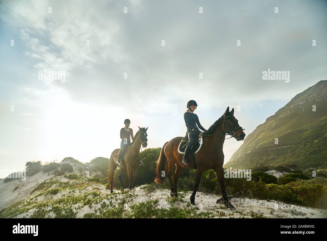 Horseback riding on beach in hi-res stock photography and images - Alamy