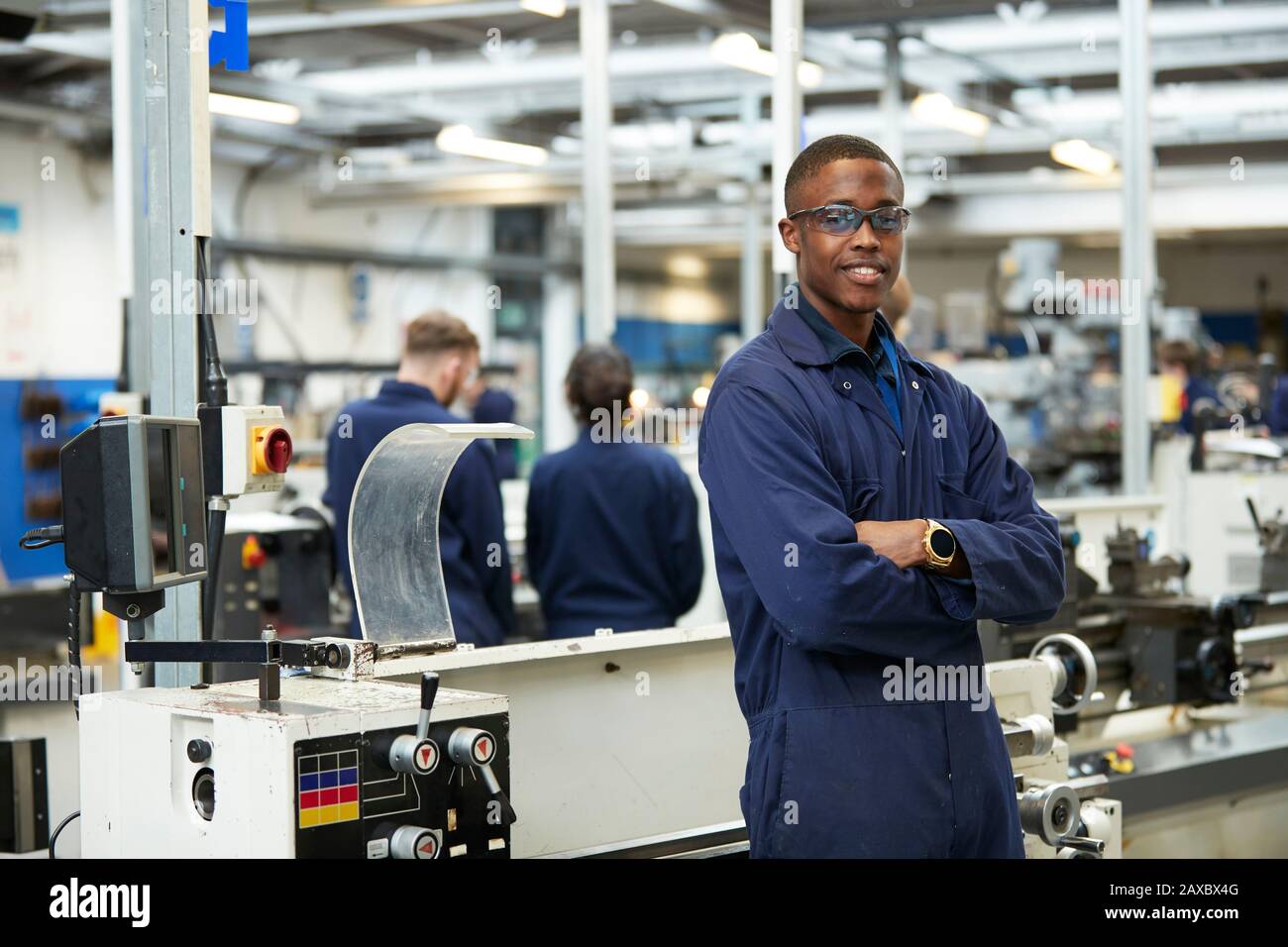 Portrait confident teenage boy student in shop class Stock Photo - Alamy