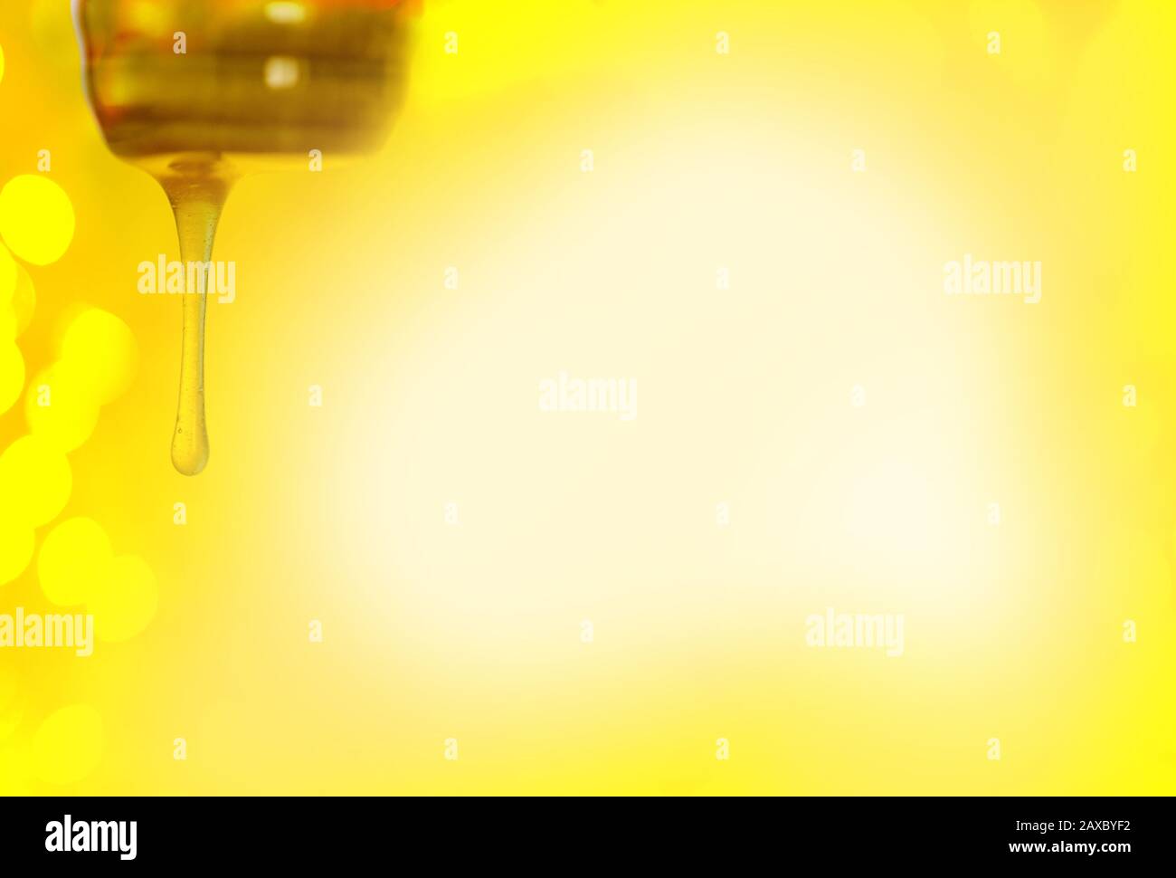 Organic sweet honey splashes. Honey flows from dipper. Honey dipping ...