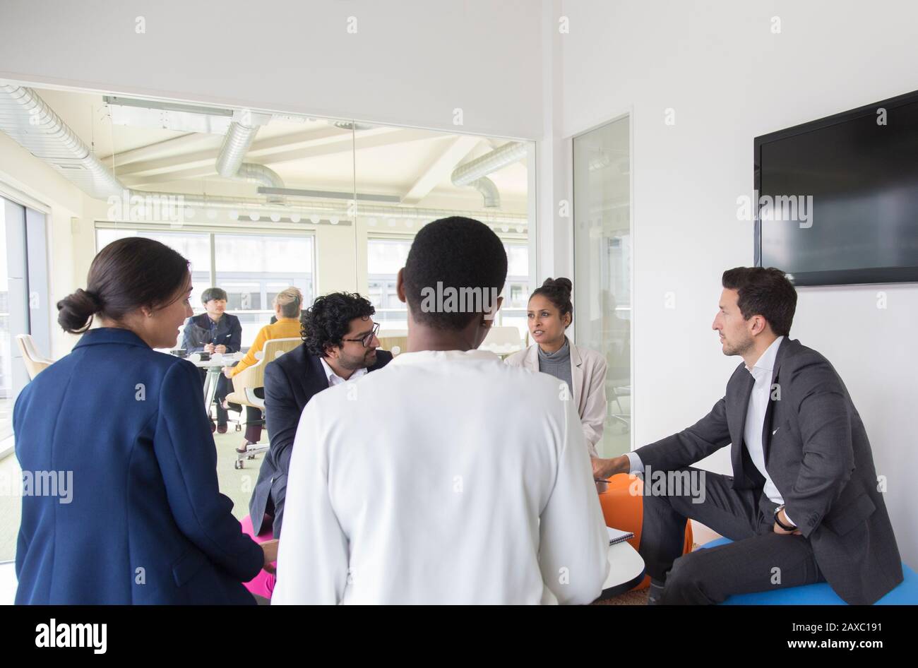 Business people talking in conference room meeting Stock Photo - Alamy