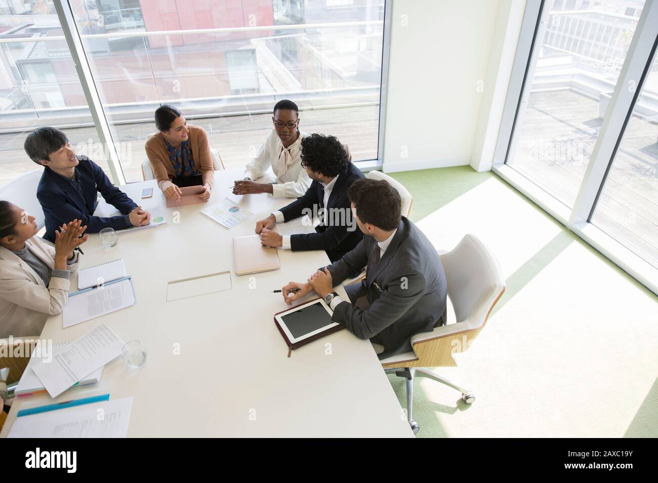 Business people talking in conference room meeting Stock Photo - Alamy