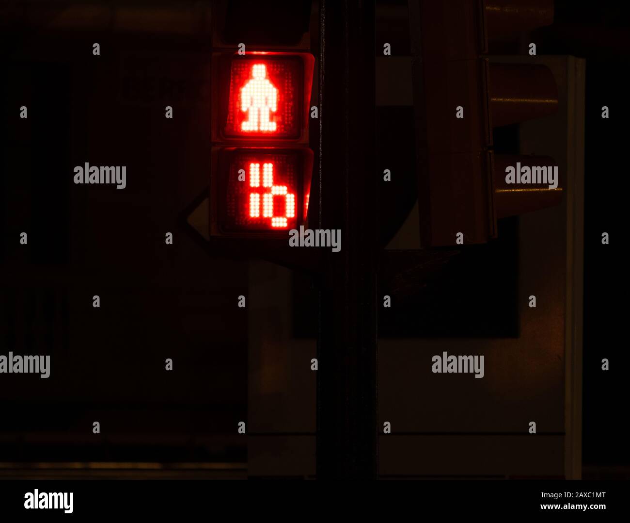 Red light on a traffic light indicating that people cannot cross the ...