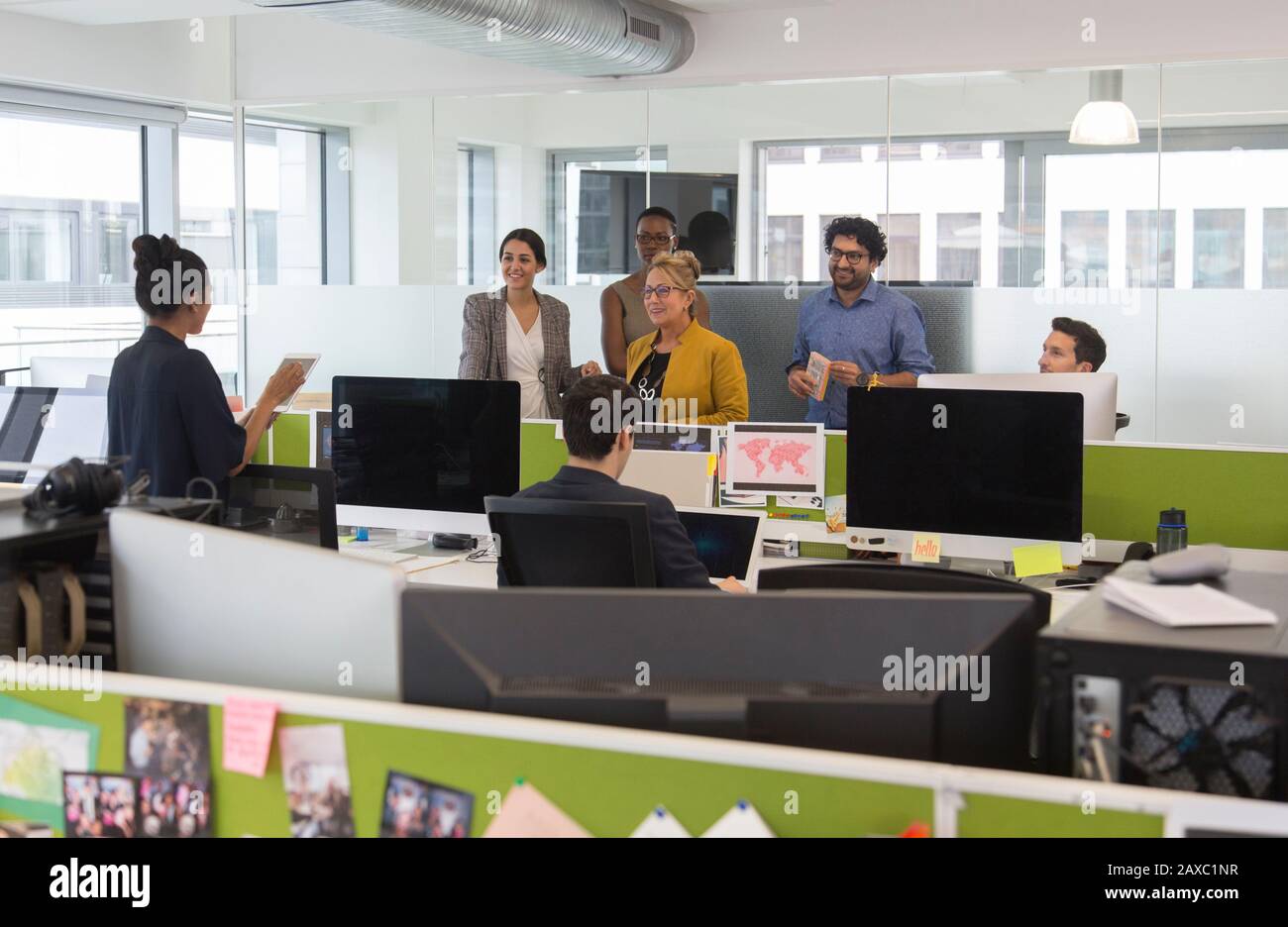 Business people meeting in open plan office Stock Photo - Alamy