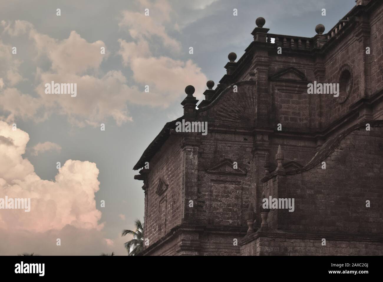 Side view of a Church in Goa with a beautiful clouds Stock Photo - Alamy