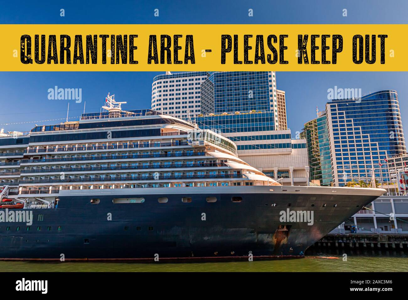 Yellow quarantine sign over a cruise ship docked at port Stock Photo ...