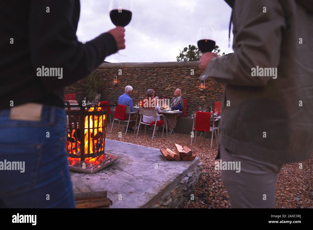 Man sitting fire drink hi-res stock photography and images - Alamy