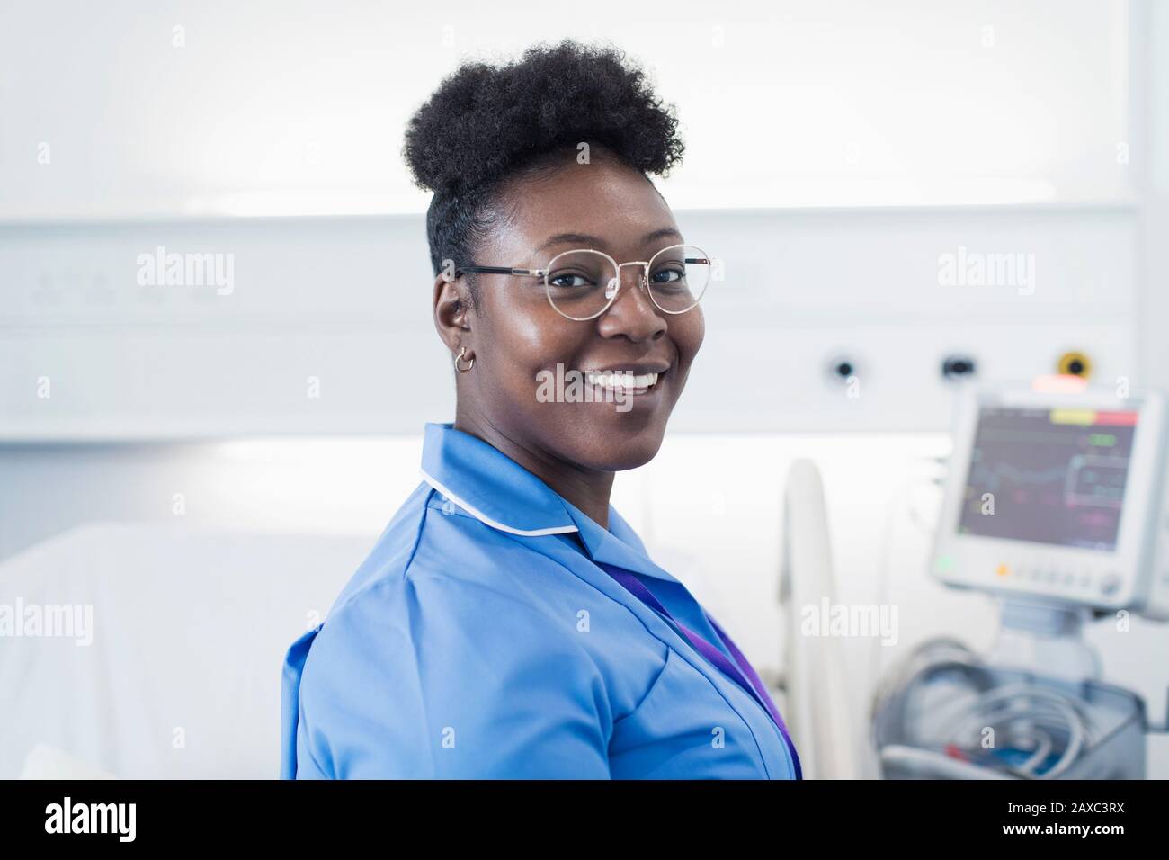 Portrait confident, smiling female nurse in hospital room Stock Photo ...