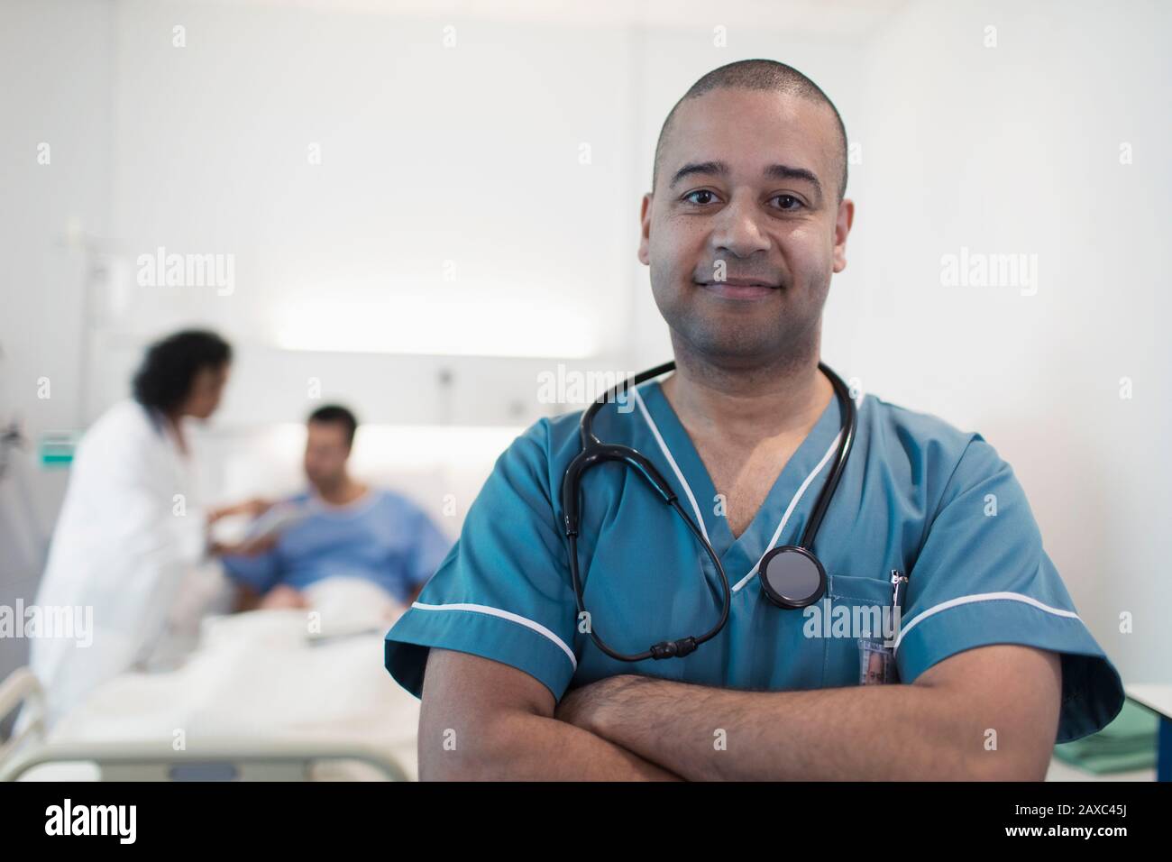 Portrait confident male nurse in hospital room Stock Photo - Alamy