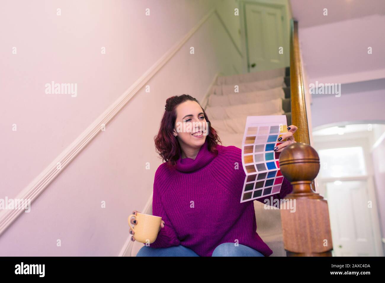 Woman redecorating hi-res stock photography and images - Alamy