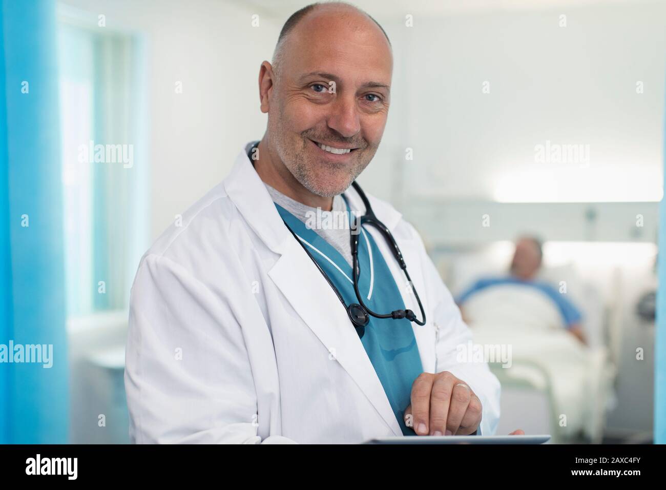 Portrait smiling mature doctor hi-res stock photography and images - Alamy