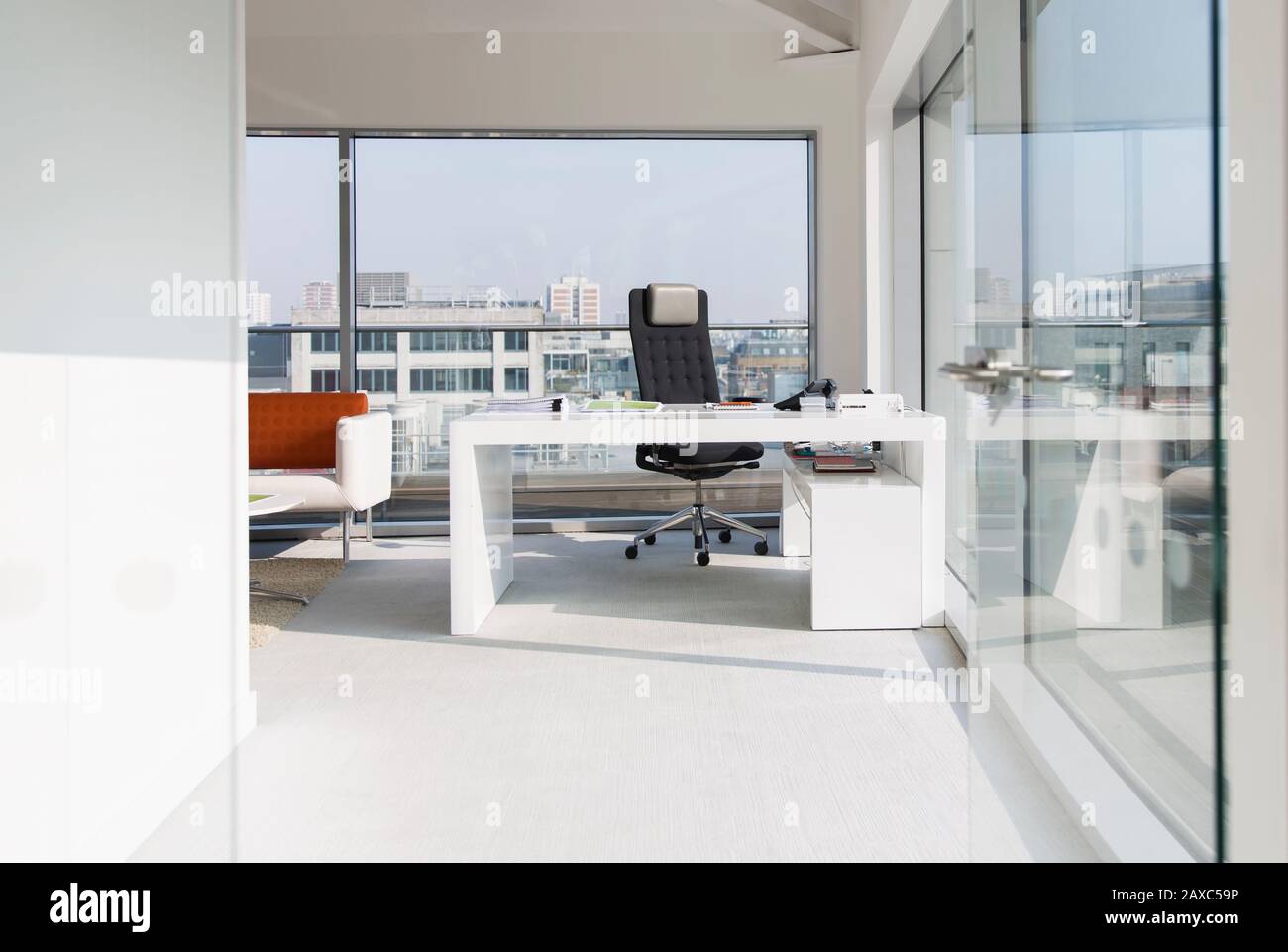 Sunny, modern, urban office Stock Photo - Alamy