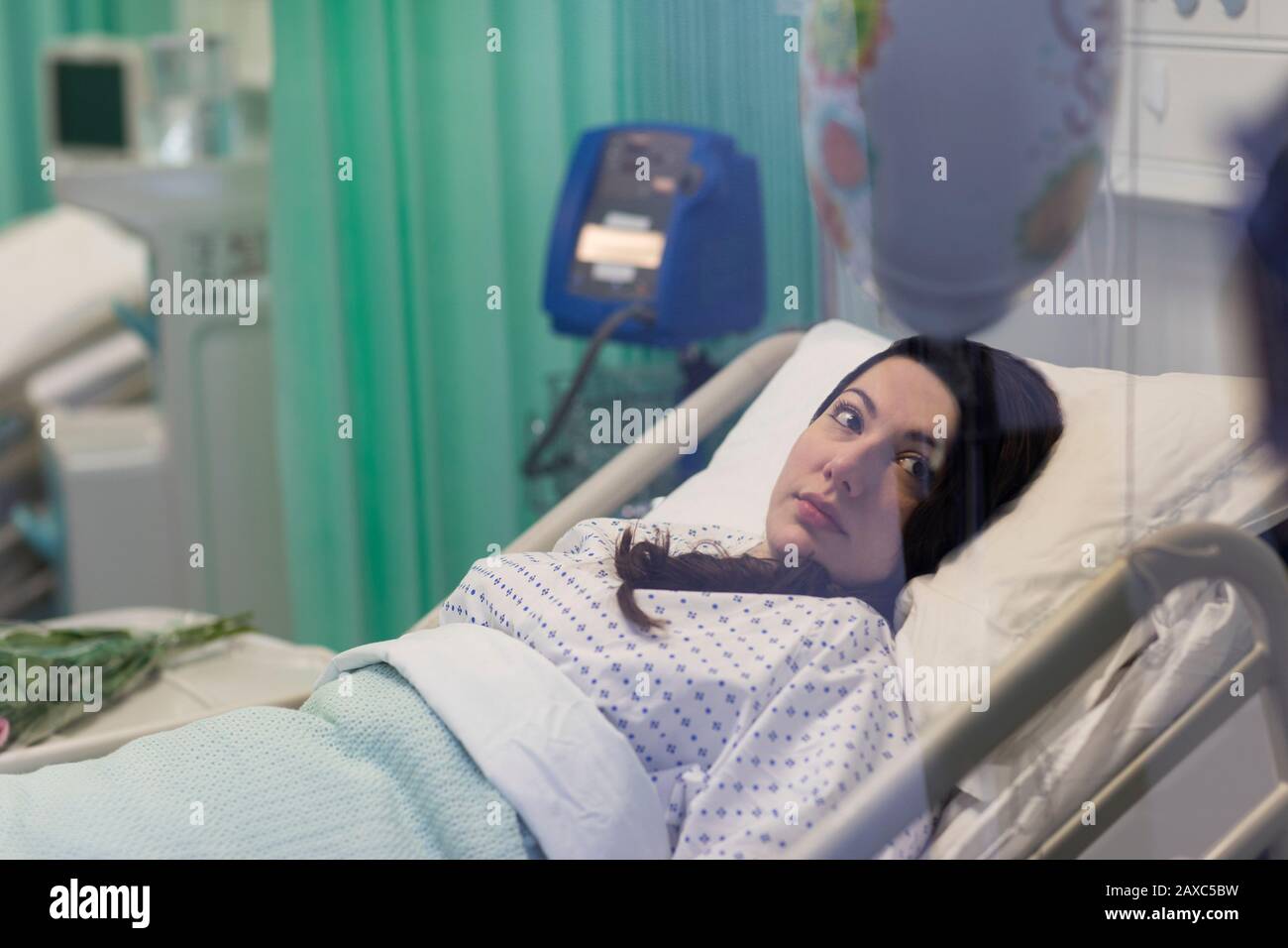 Female patient resting in hospital bed Stock Photo - Alamy