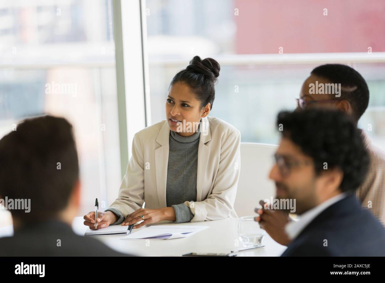 Business people listening in conference room meeting Stock Photo - Alamy