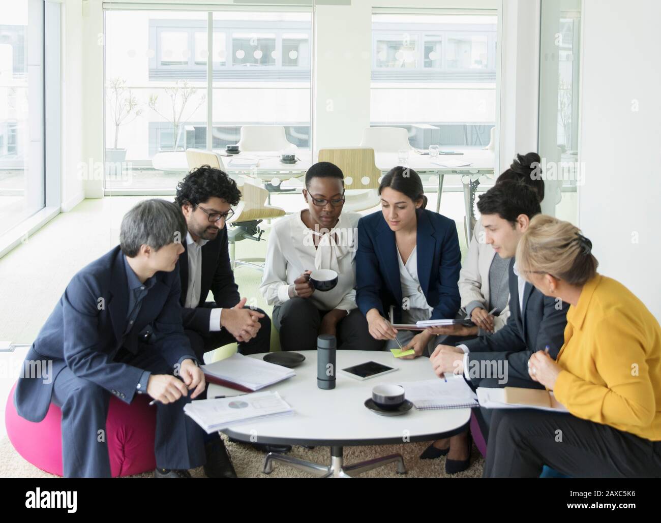 Business people planning in office Stock Photo - Alamy