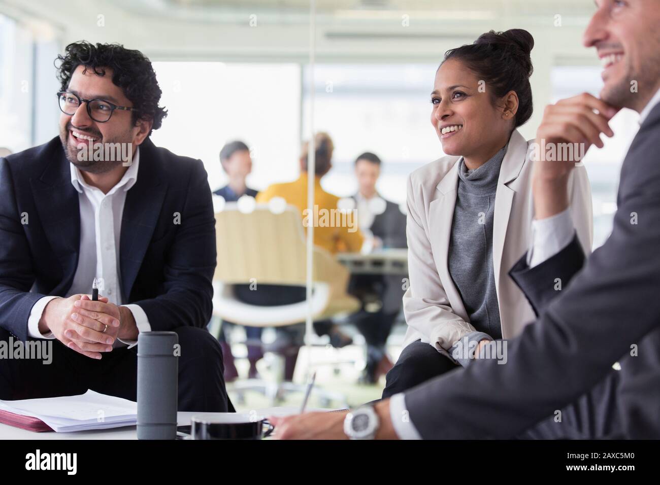Business people talking in meeting Stock Photo - Alamy