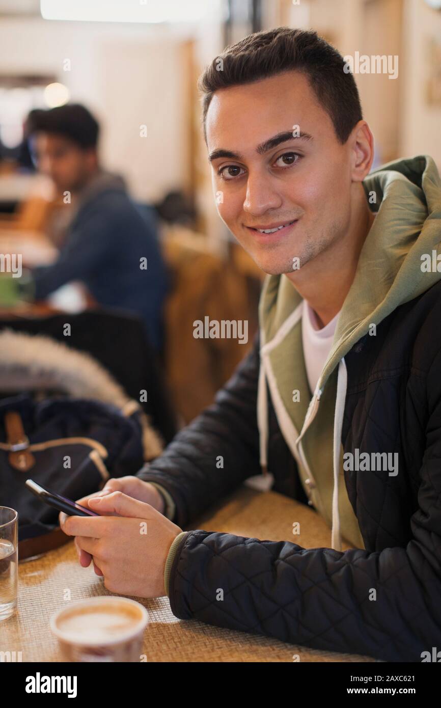 Smart confident man sitting table hi-res stock photography and images ...