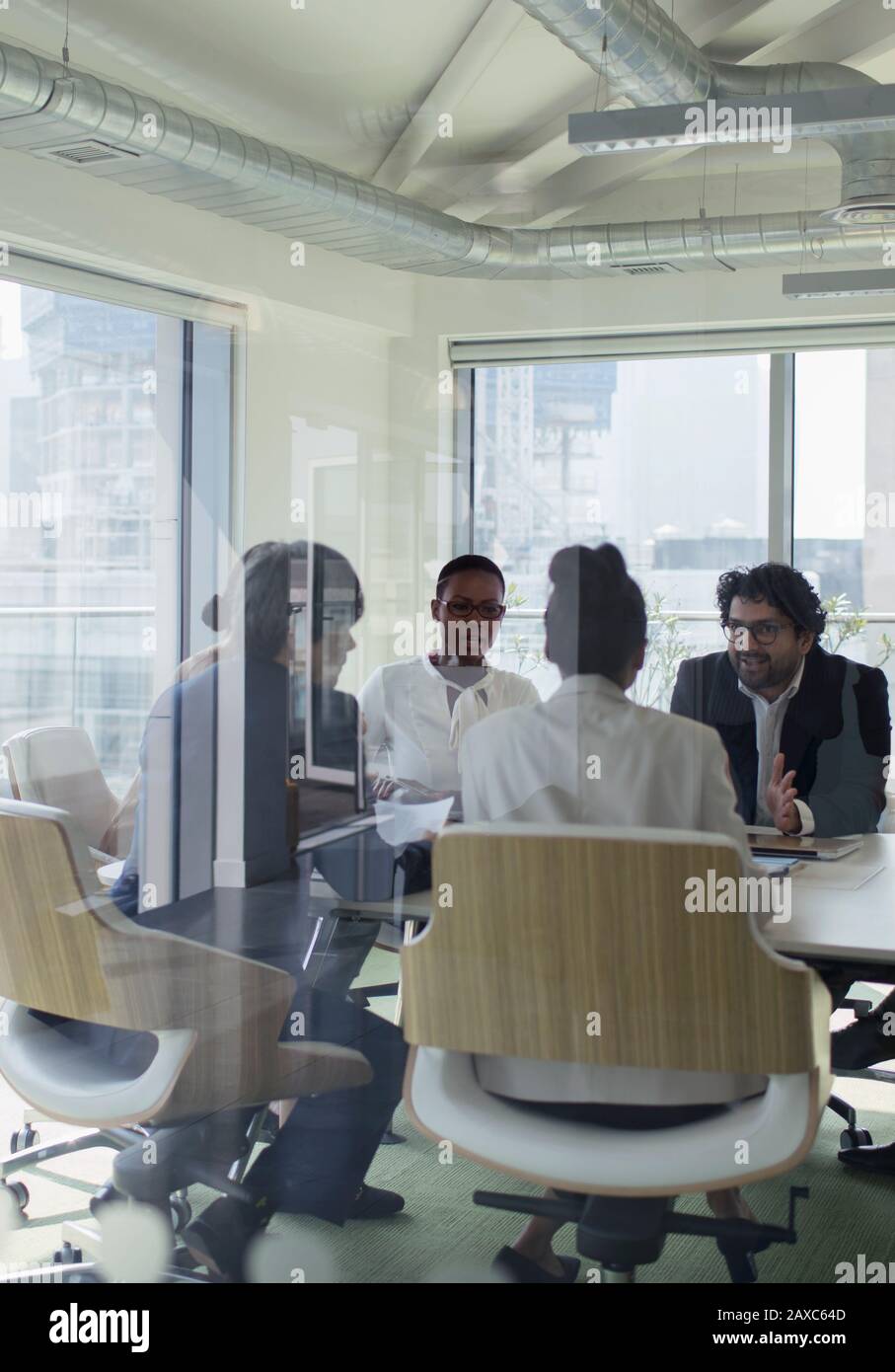 Business people talking in conference room meeting Stock Photo - Alamy