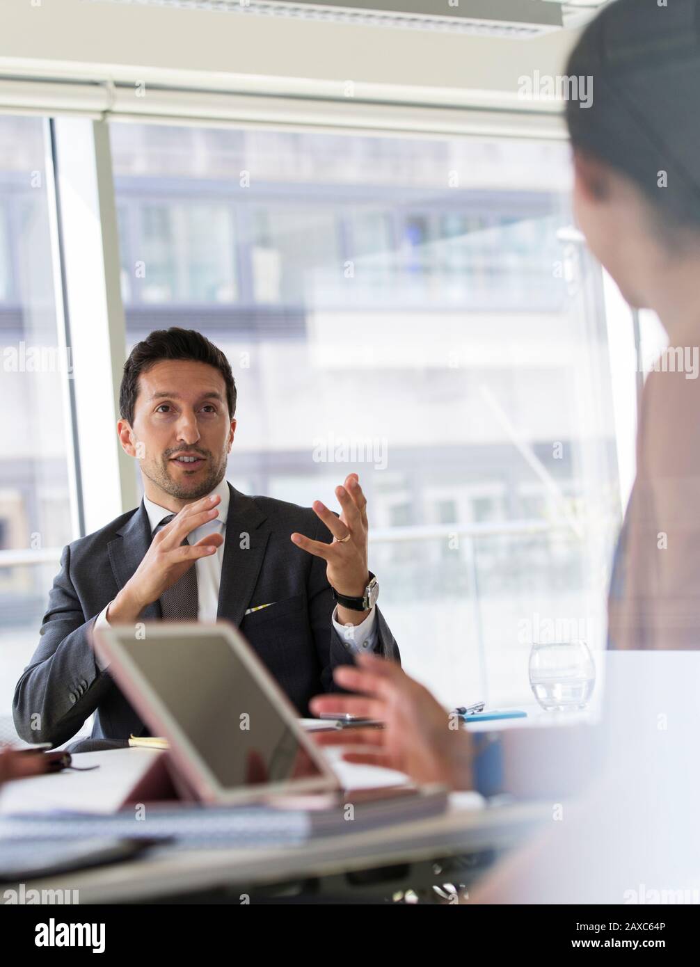 Businessman talking colleague hi-res stock photography and images - Alamy