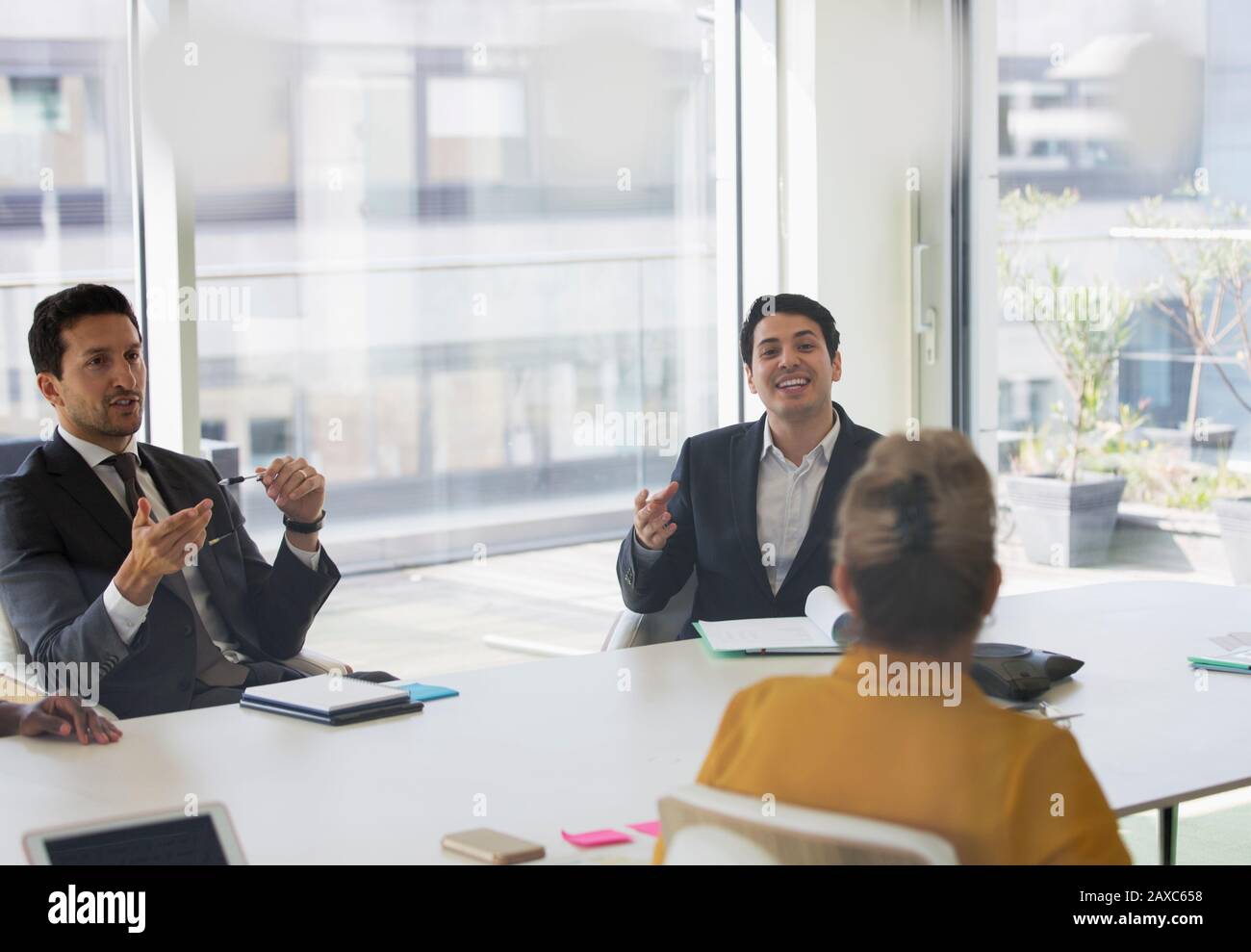 Business people talking in conference room meeting Stock Photo - Alamy