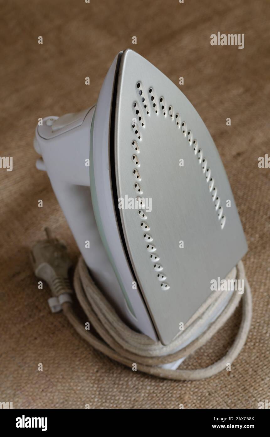 Wrapped electrical cord around the iron. The end of the routine ...