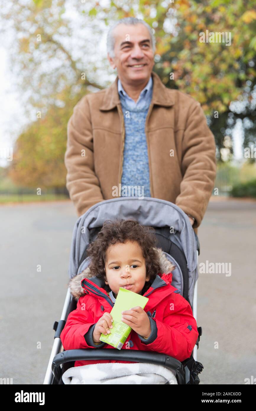 Boys pushing box hi-res stock photography and images - Alamy