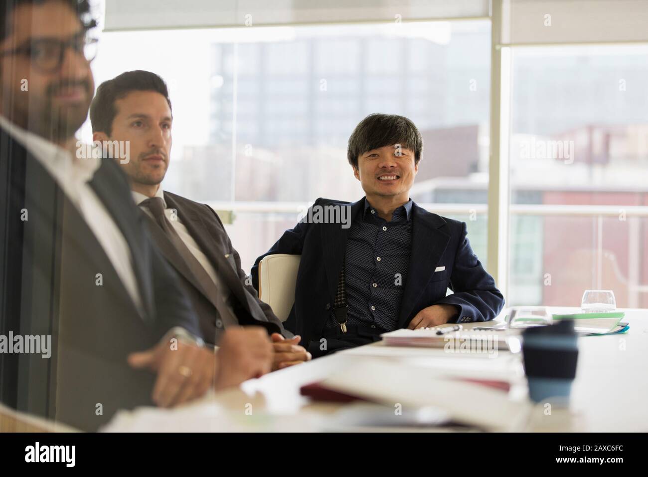 Smiling indian businessman sitting hi-res stock photography and images ...