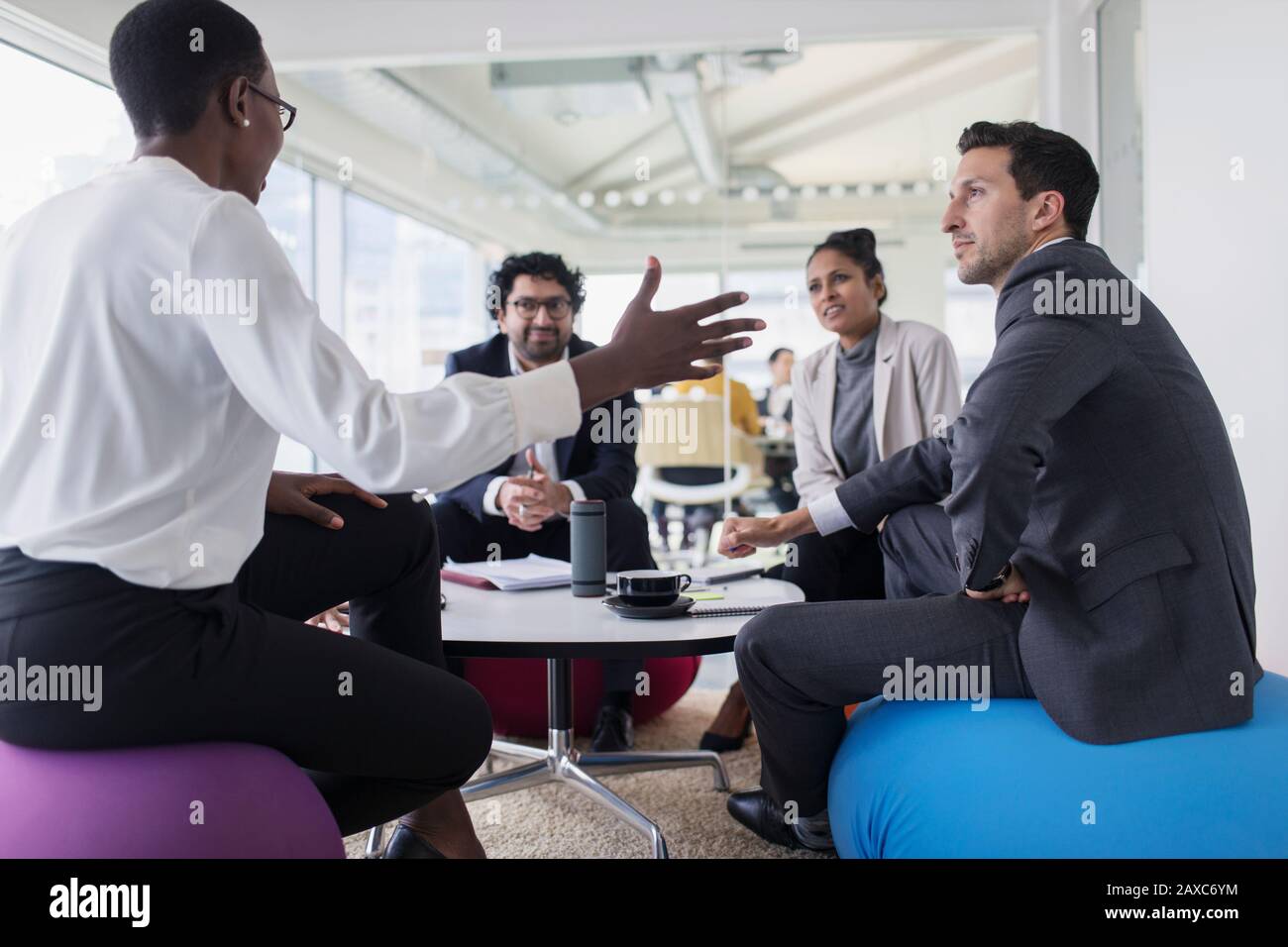 Business people talking in conference room meeting Stock Photo - Alamy