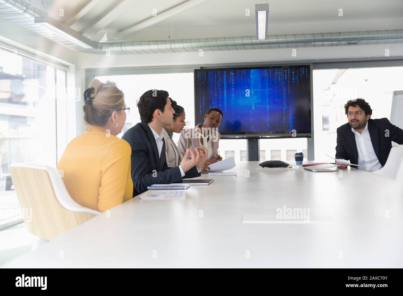 Business people talking in conference room meeting Stock Photo - Alamy