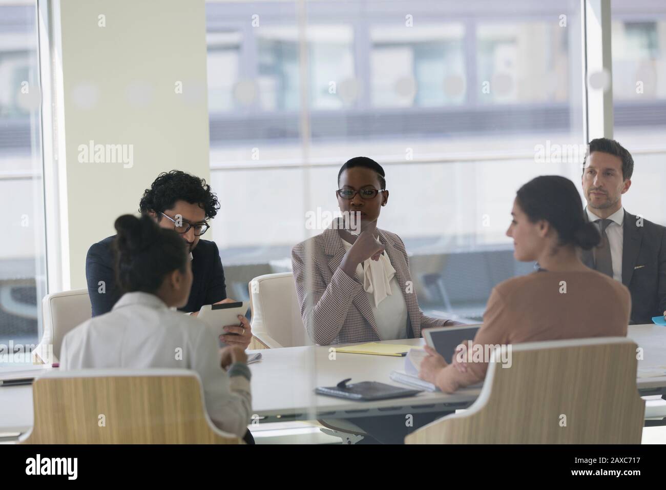 Business people talking in conference room meeting Stock Photo - Alamy