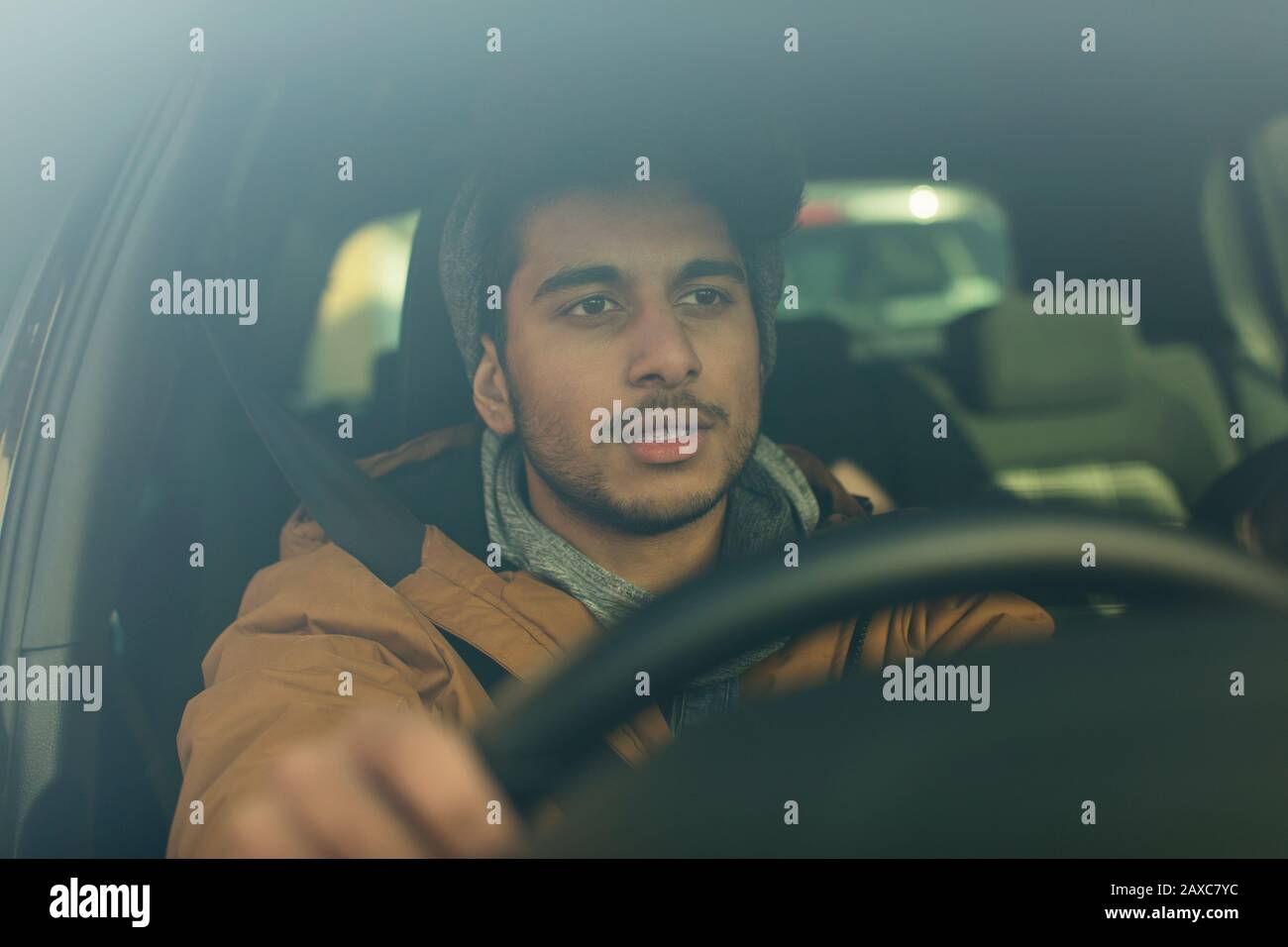 Indian young man driving hi-res stock photography and images - Alamy