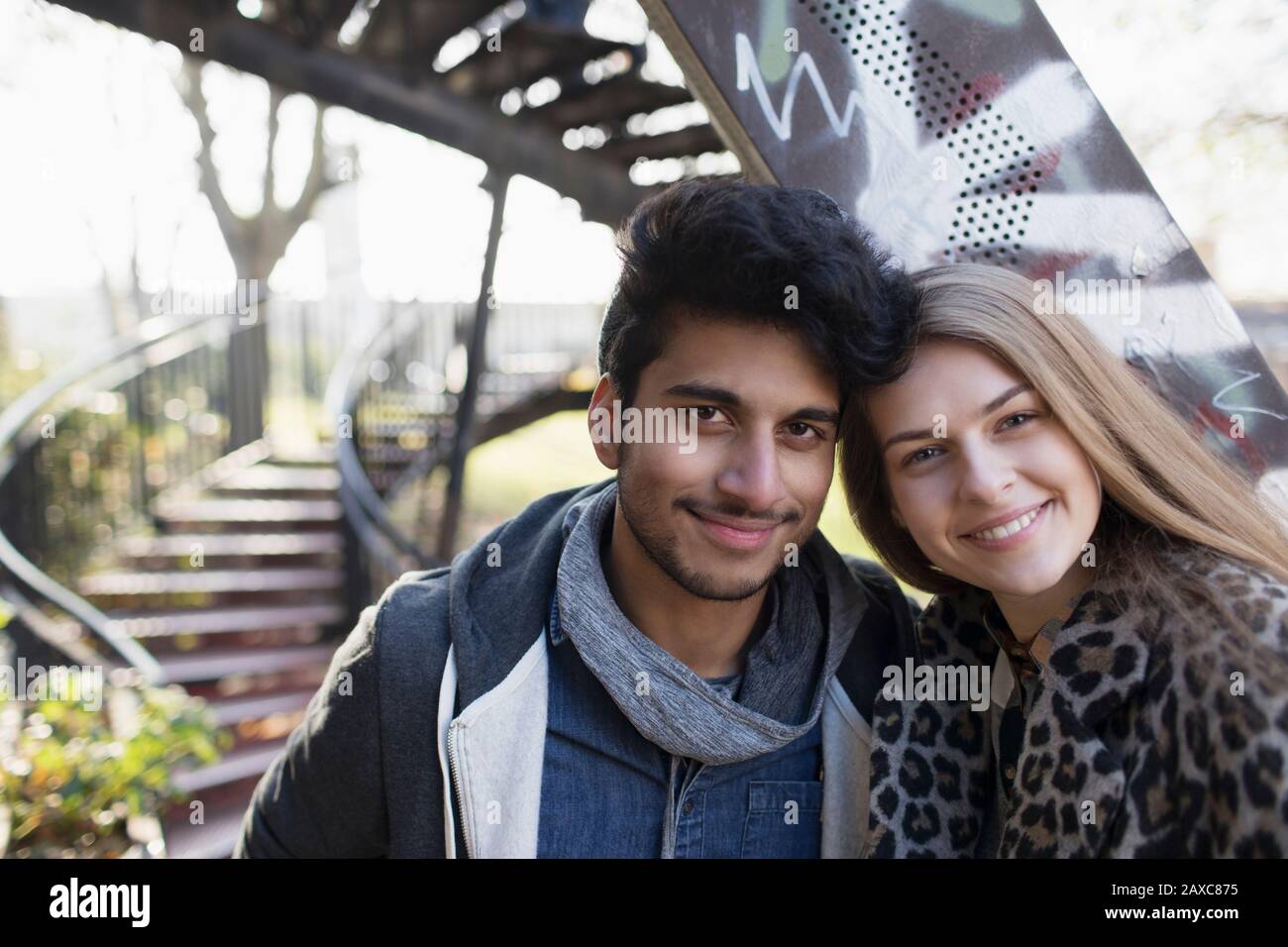 Portrait confident young couple Stock Photo - Alamy