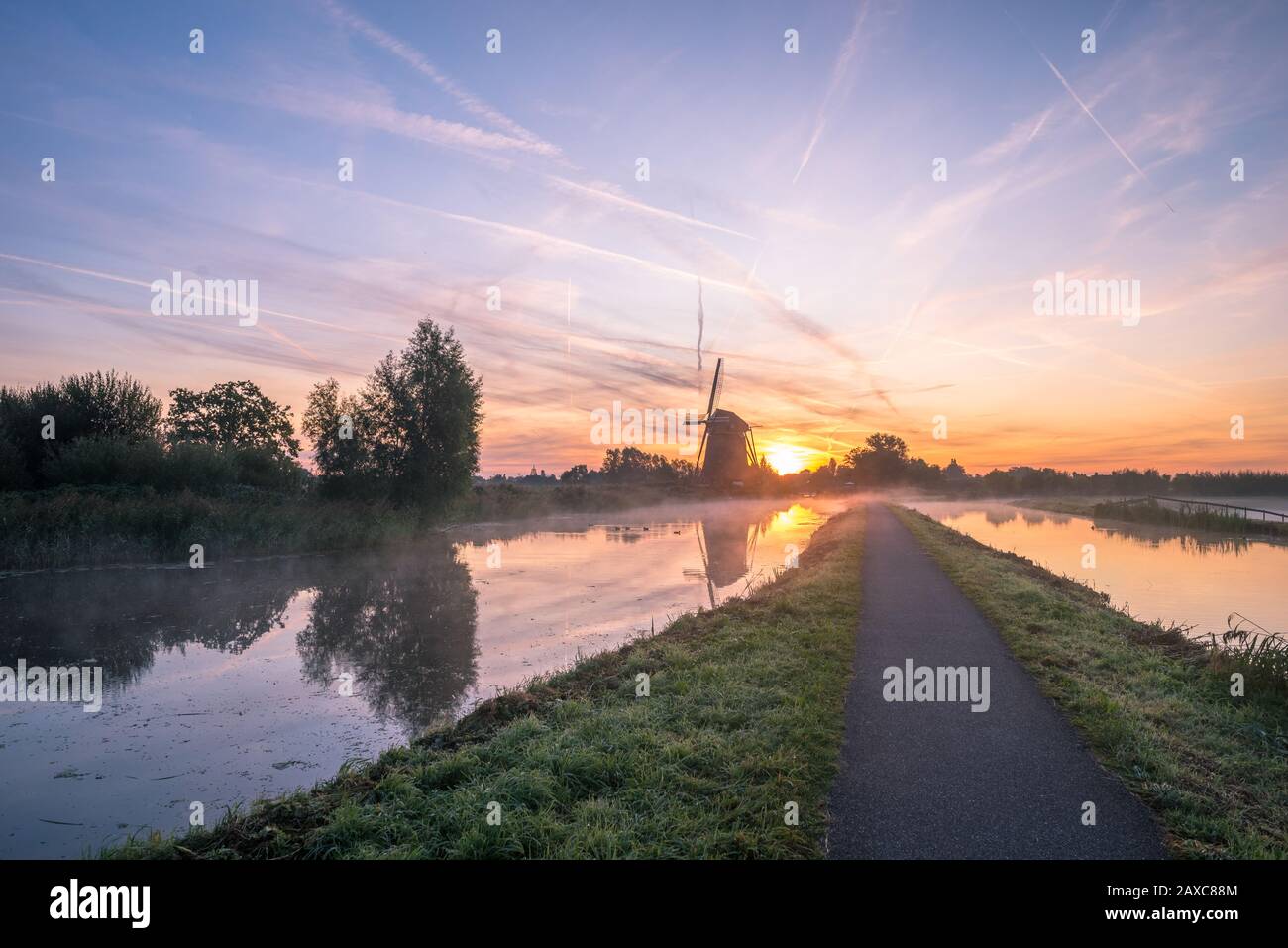 Sunrise with windmill hi-res stock photography and images - Alamy